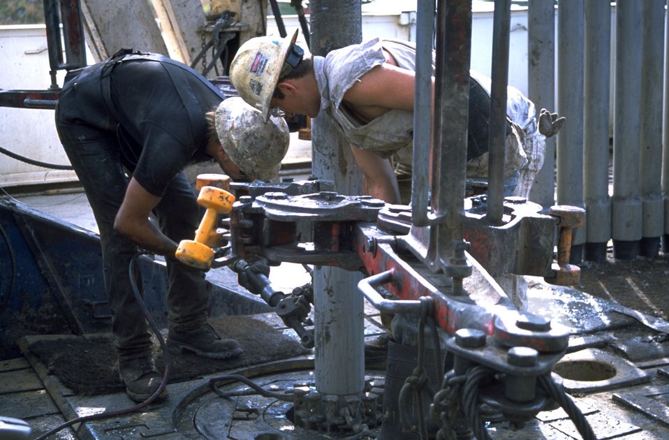 Public Domain Picture | Roughnecks working on drilling rig platform ...